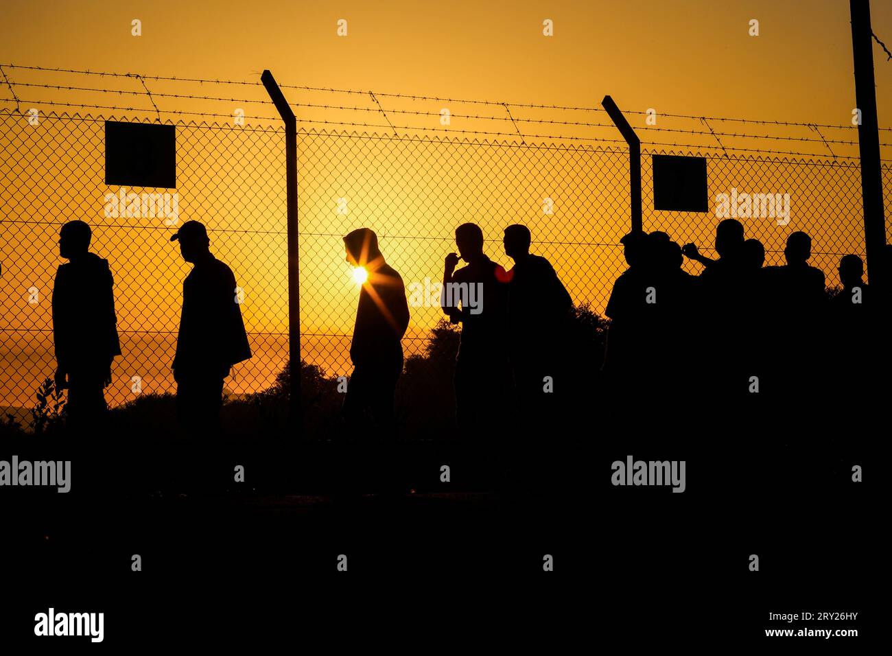 Palestinian workers gather at the Erez crossing between Israel and the ...