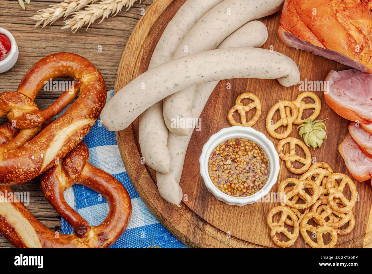 Traditional Oktoberfest set. Pretzels, beer, weisswurst and eisbein ...