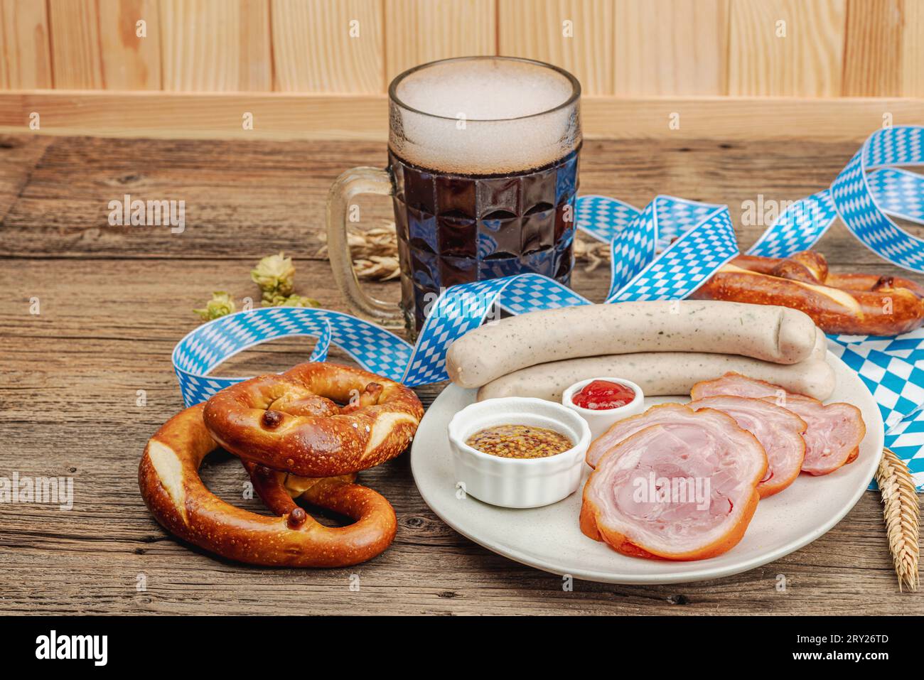 Traditional Oktoberfest set. Pretzels, beer, weisswurst and eisbein ...