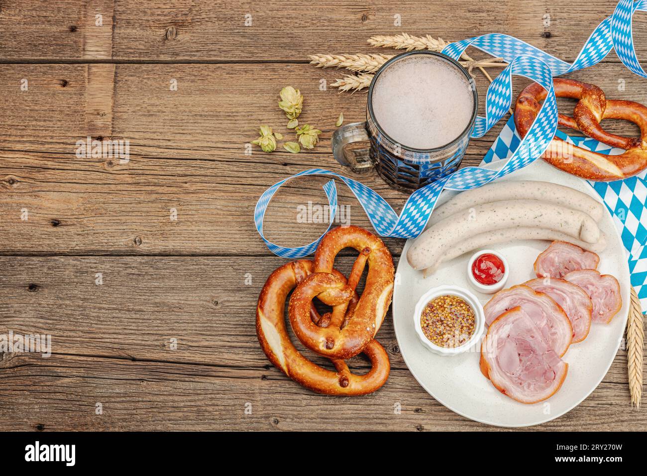 Traditional Oktoberfest set. Pretzels, beer, weisswurst and eisbein ...