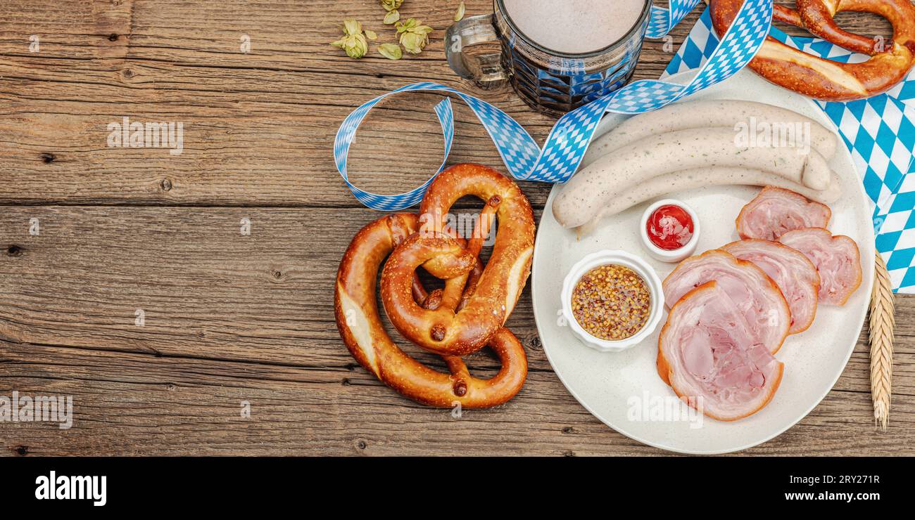 Traditional Oktoberfest set. Pretzels, beer, weisswurst and eisbein ...