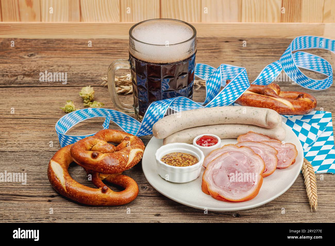 Traditional Oktoberfest set. Pretzels, beer, weisswurst and eisbein ...