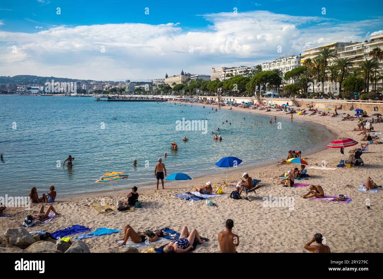 People relax on Zamenhof public beach in the late afternoon in Cannes ...