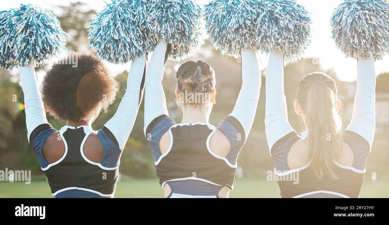 Back of cheerleader, sports and women on field for performance, dance ...