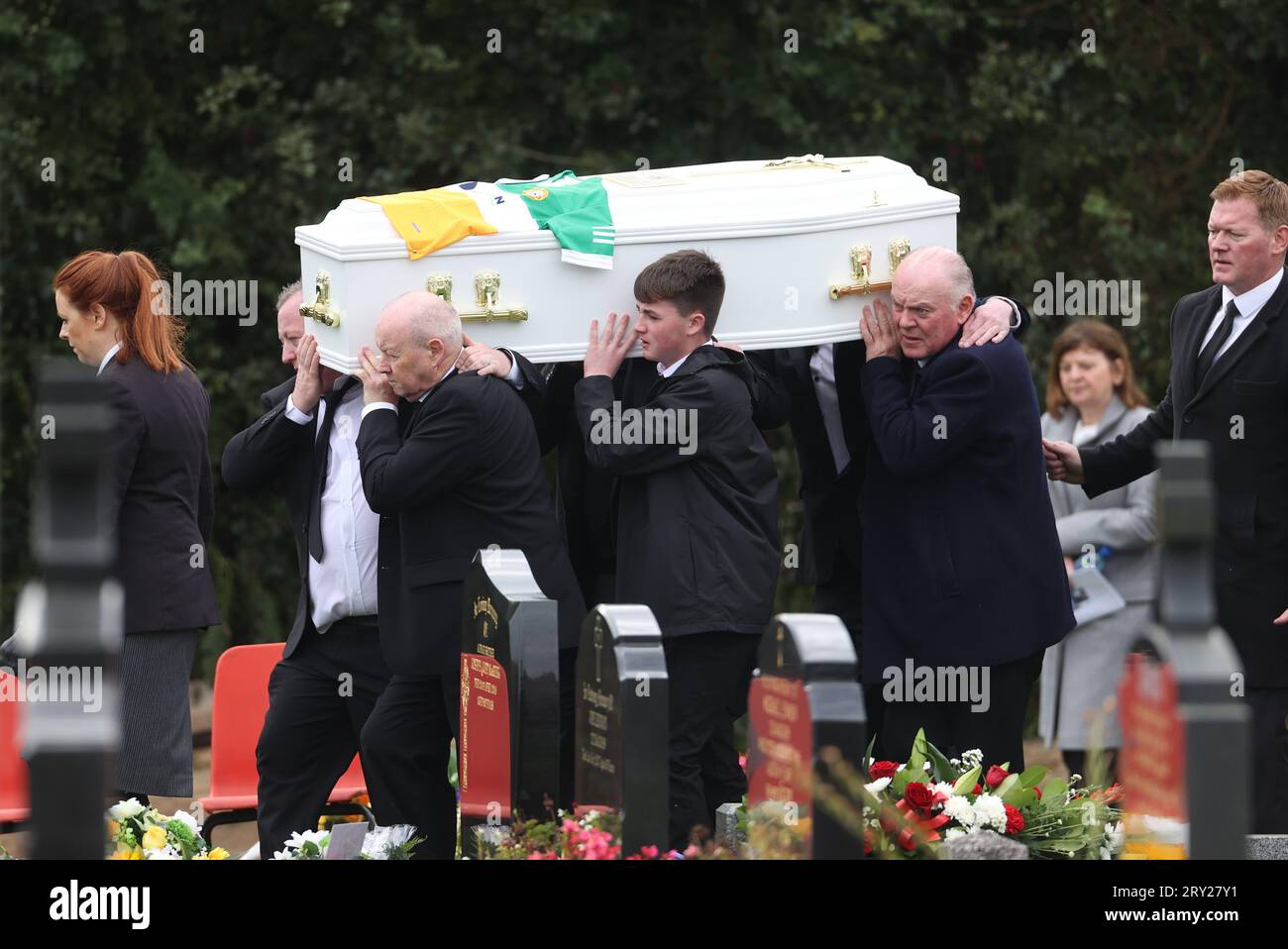 The coffin of Ronan Wilson is carried from St. Mary's Church, Dunamore ...