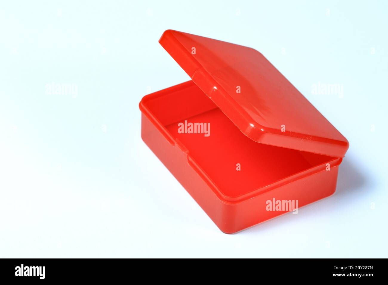 Open empty small red plastic box isolated on white background Stock ...