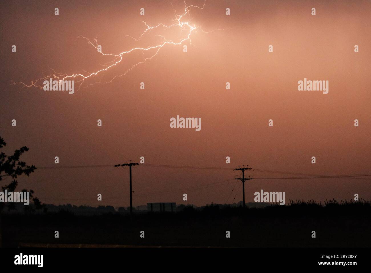 Lightning Strike Next To A Utility Pole Stock Photo - Alamy