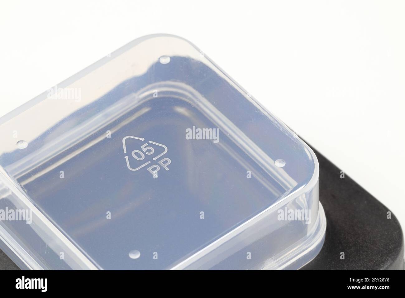 Close up recycle mark on transparent plastic box Stock Photo - Alamy