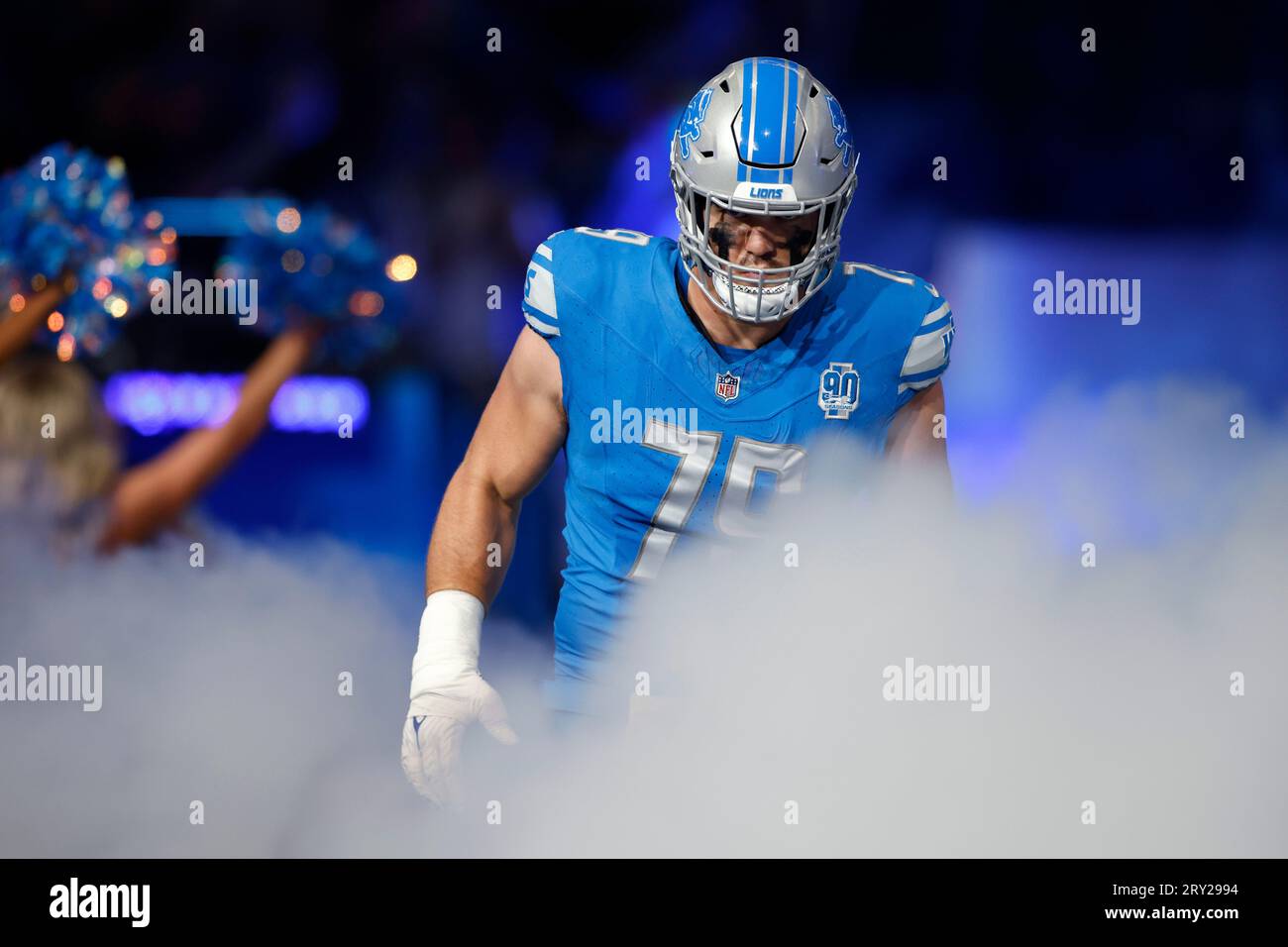 Detroit Lions defensive lineman John Cominsky is introduced before an ...
