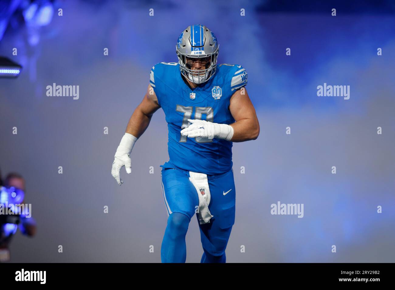 Detroit Lions defensive lineman John Cominsky is introduced before an ...
