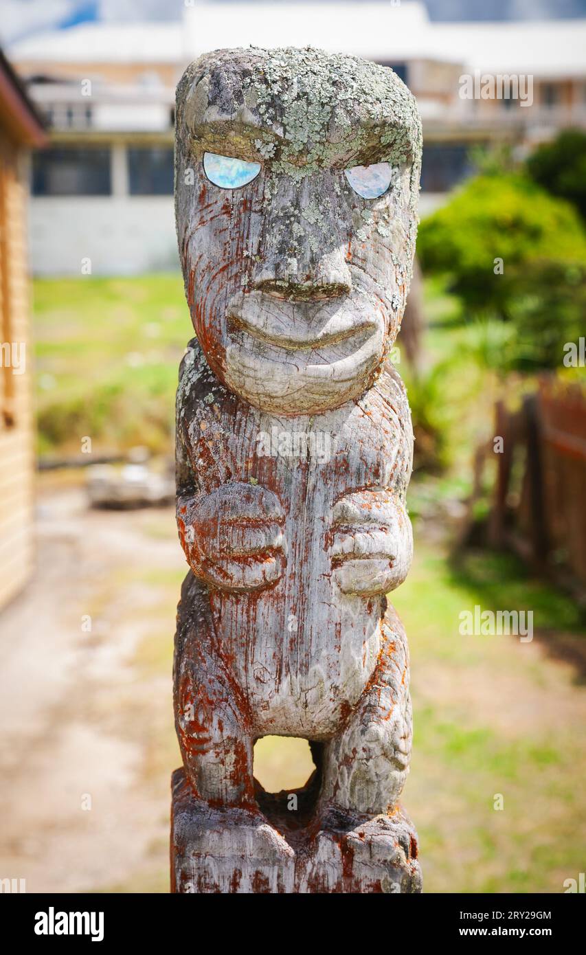 Weathered traditional Maori wooden carved figure Tekoteko featuring ...