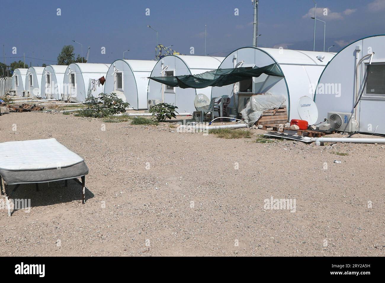A shot of a temporary settlement for Syrian refugees displaced by ...