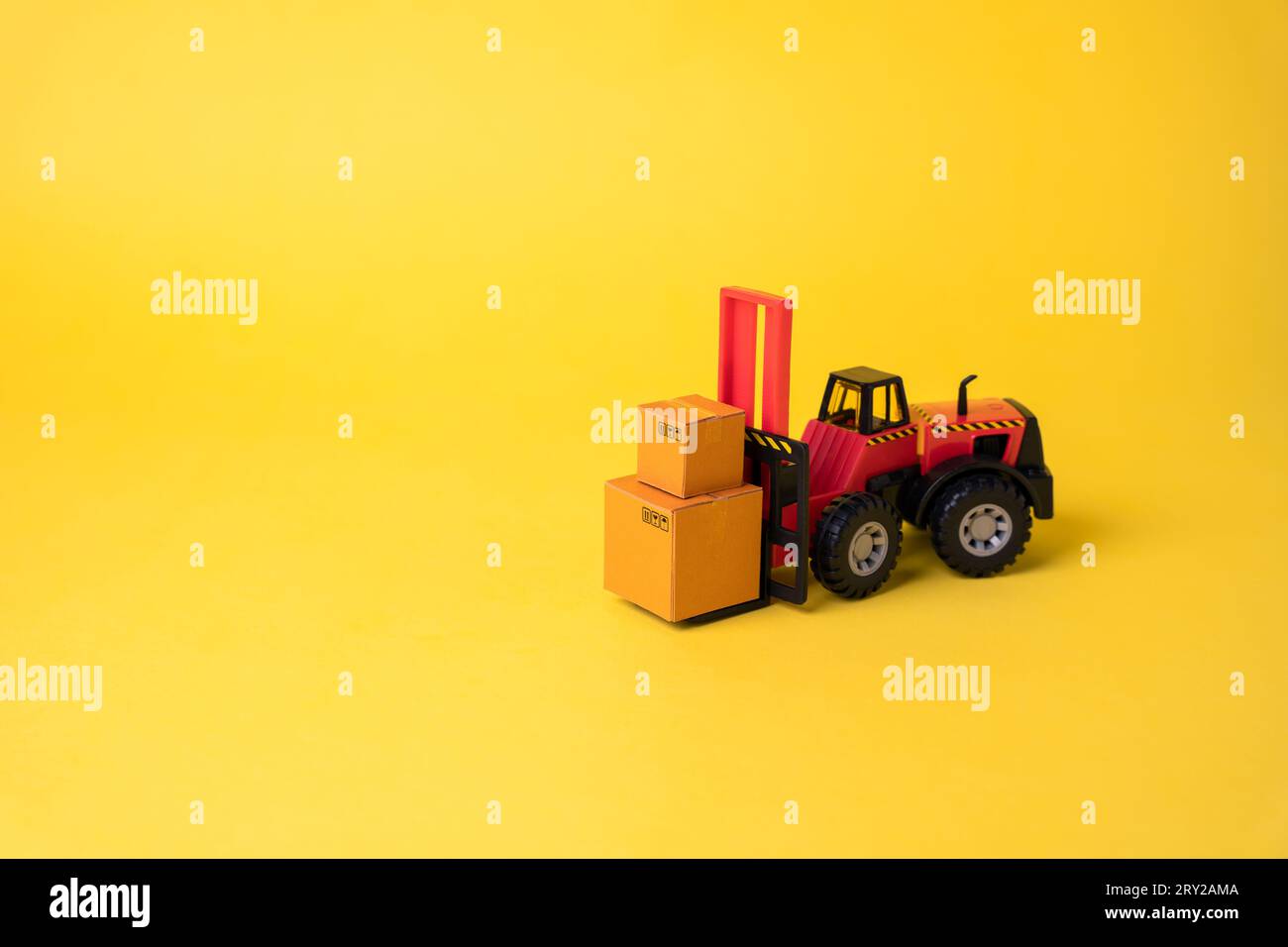 Forklift loading boxes. Warehouses, manufacturing facilities, and ...