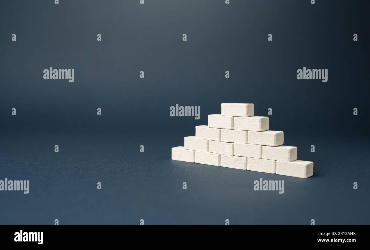 Pyramid of bricks. Pyramid with hierarchical structure. Career ...