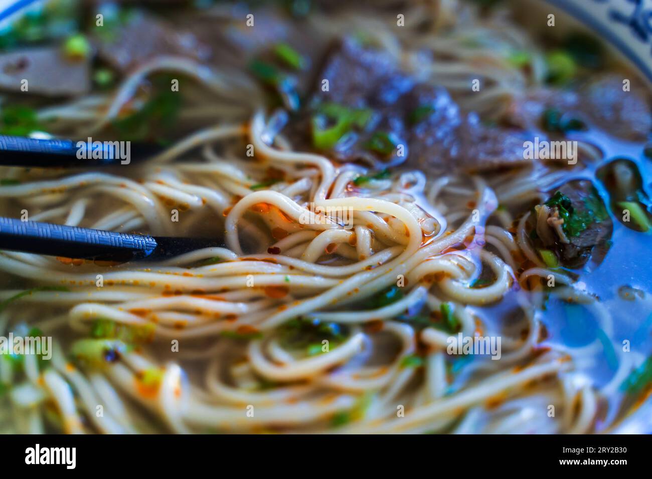 Chinese noodle soup. Asian style ramen noodles with beef and broth ...