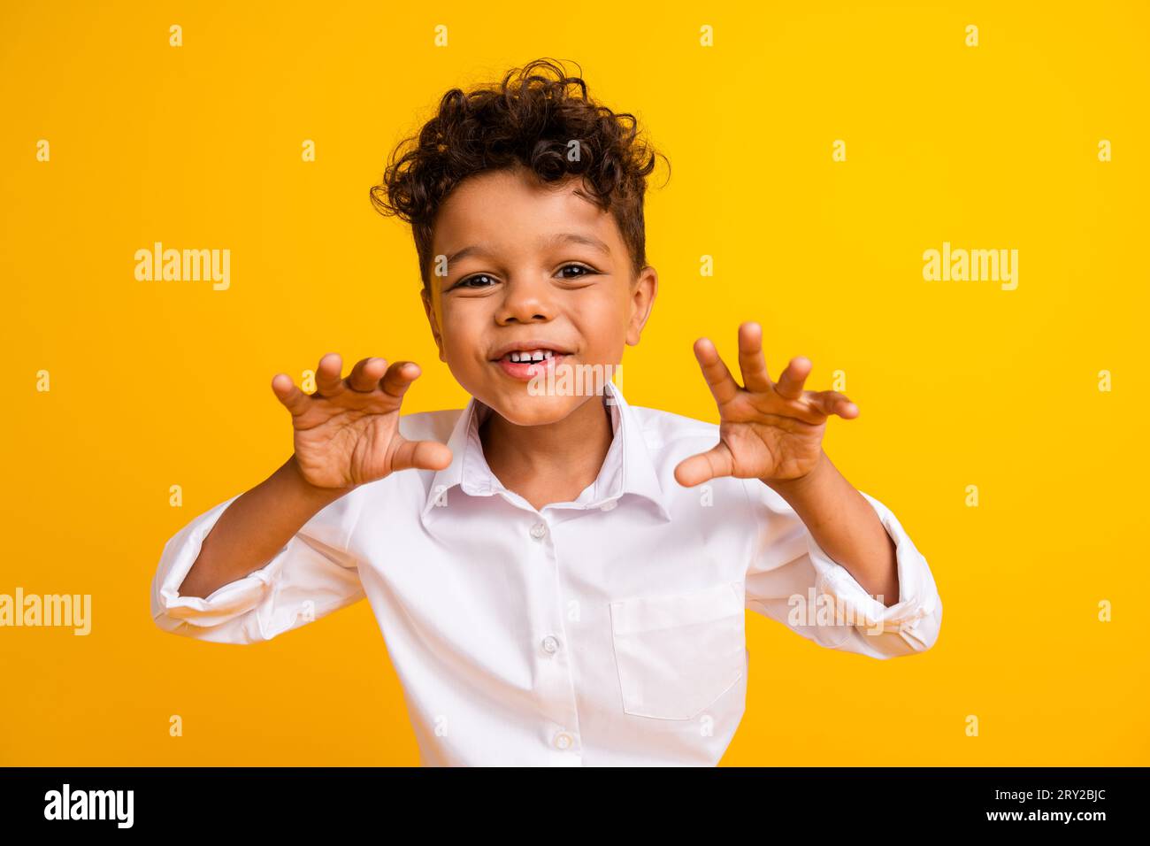 Photo of funny funky good mood schoolboy with curly hair dressed white ...