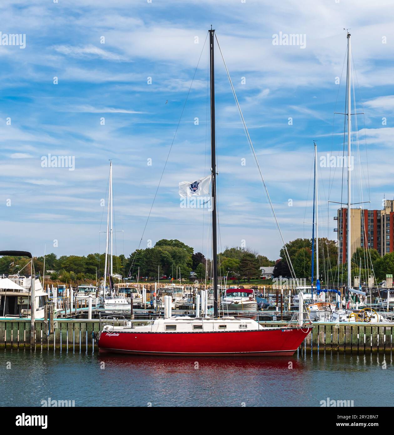 An isolated boat at the marina on Lake Erie next to the Dunkirk City ...