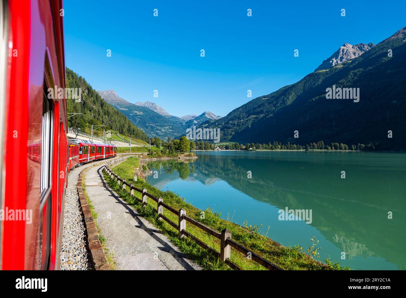 Red train of Bernina in the Swiss alps Stock Photo - Alamy