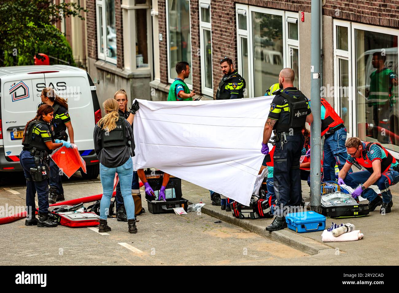 ROTTERDAM - Special units of the police and fire brigade at a fire in a ...
