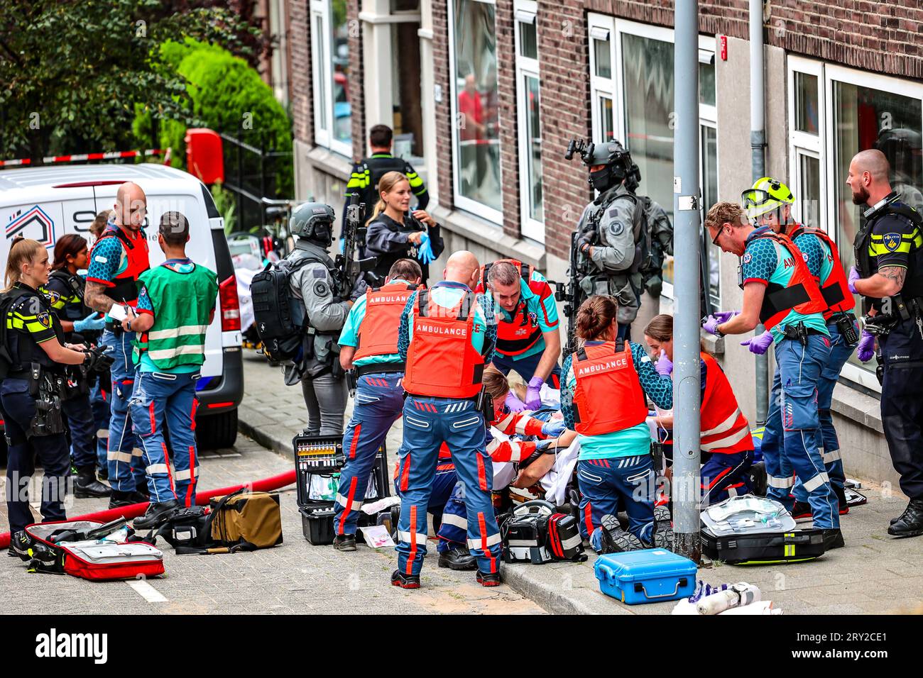 ROTTERDAM - Special units of the police and fire brigade at a fire in a ...