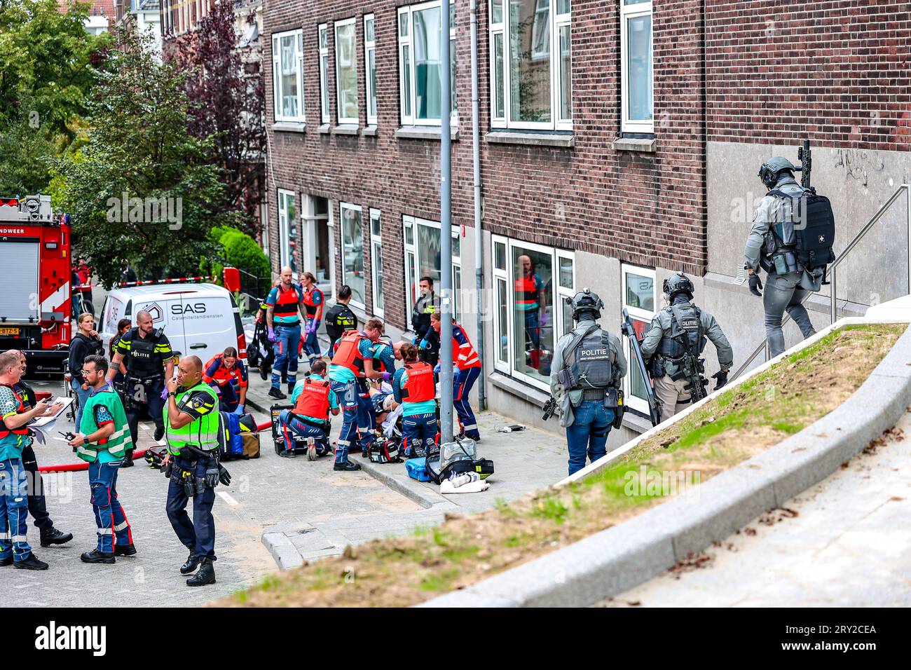 ROTTERDAM - Special units of the police and fire brigade at a fire in a ...