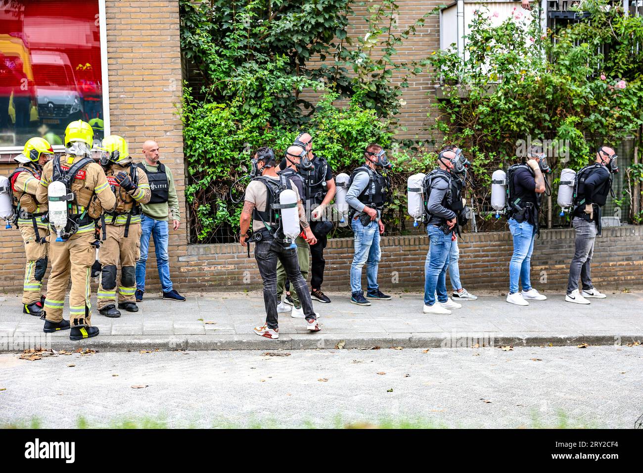 ROTTERDAM - Special units of the police and fire brigade at a fire in a ...