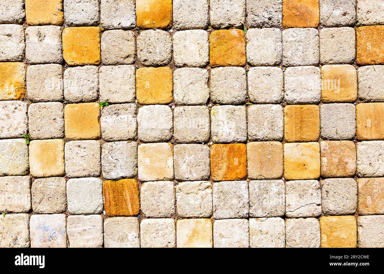 Square shaped stone paving slabs as a creative background, stone ...
