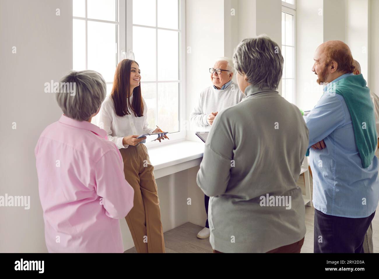 Group listening to a speaker hi-res stock photography and images - Alamy