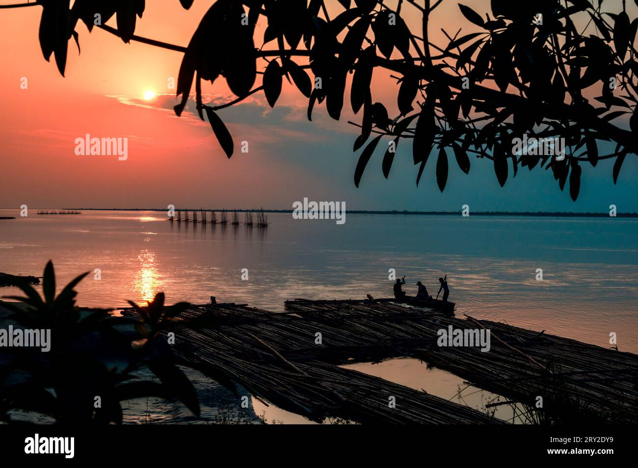 Sunset on the river. Fishermen at sunset, Brahmaputra River. Dibrugarh ...