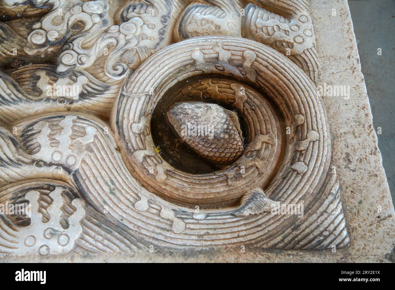 The stone carving texture is on a stone slab in the Eastern Tombs of ...