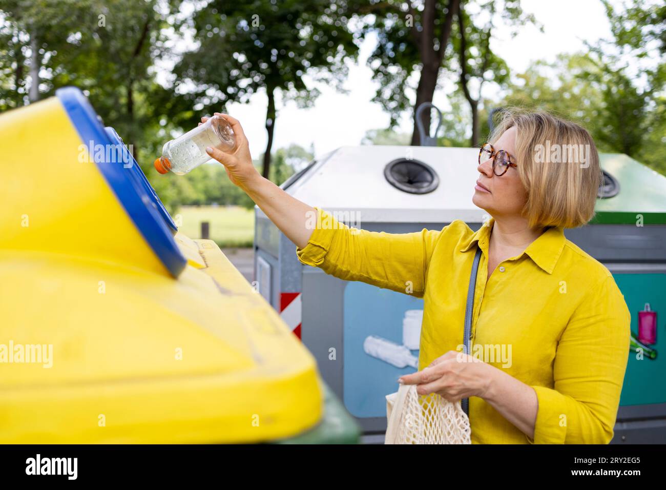 Woman garbage eyeglasses hi-res stock photography and images - Alamy