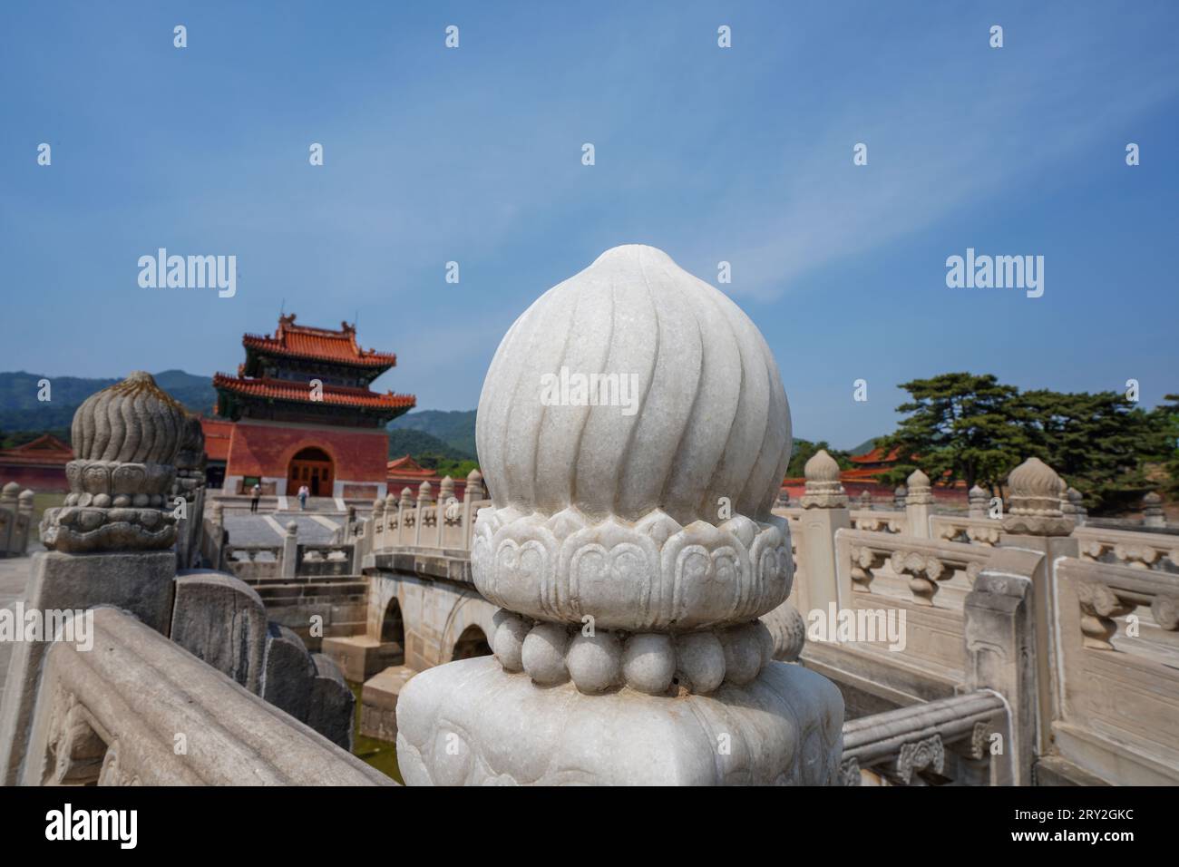 The stone bridge railing and column heads are located in the Eastern ...