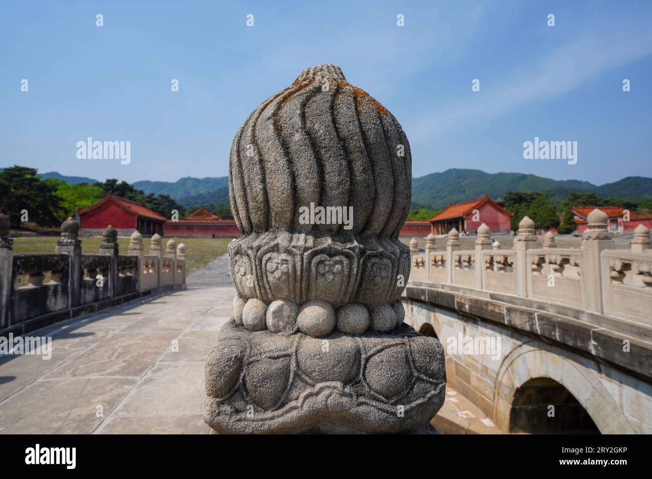 The stone bridge railing and column heads are located in the Eastern ...