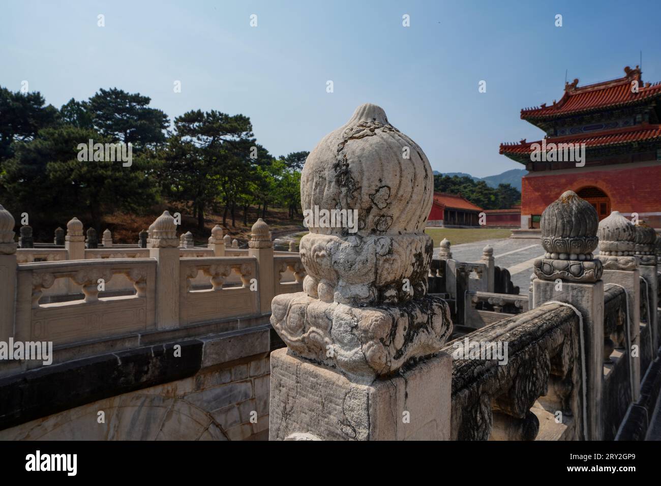 The stone bridge railing and column heads are located in the Eastern ...
