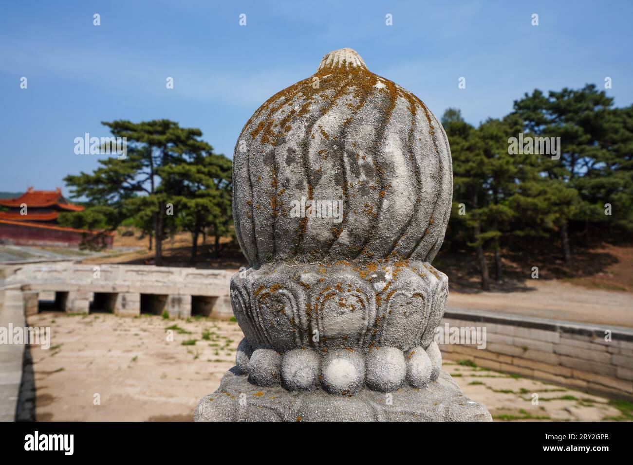 The stone bridge railing and column heads are located in the Eastern ...
