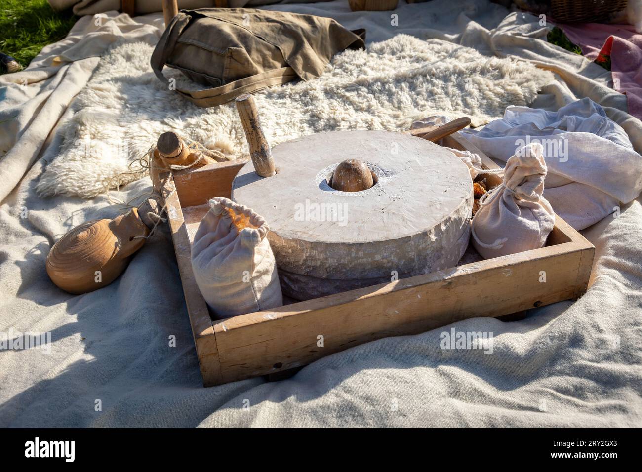 Viking camp has a Quern-stone to grind grist into flour, celebrating ...
