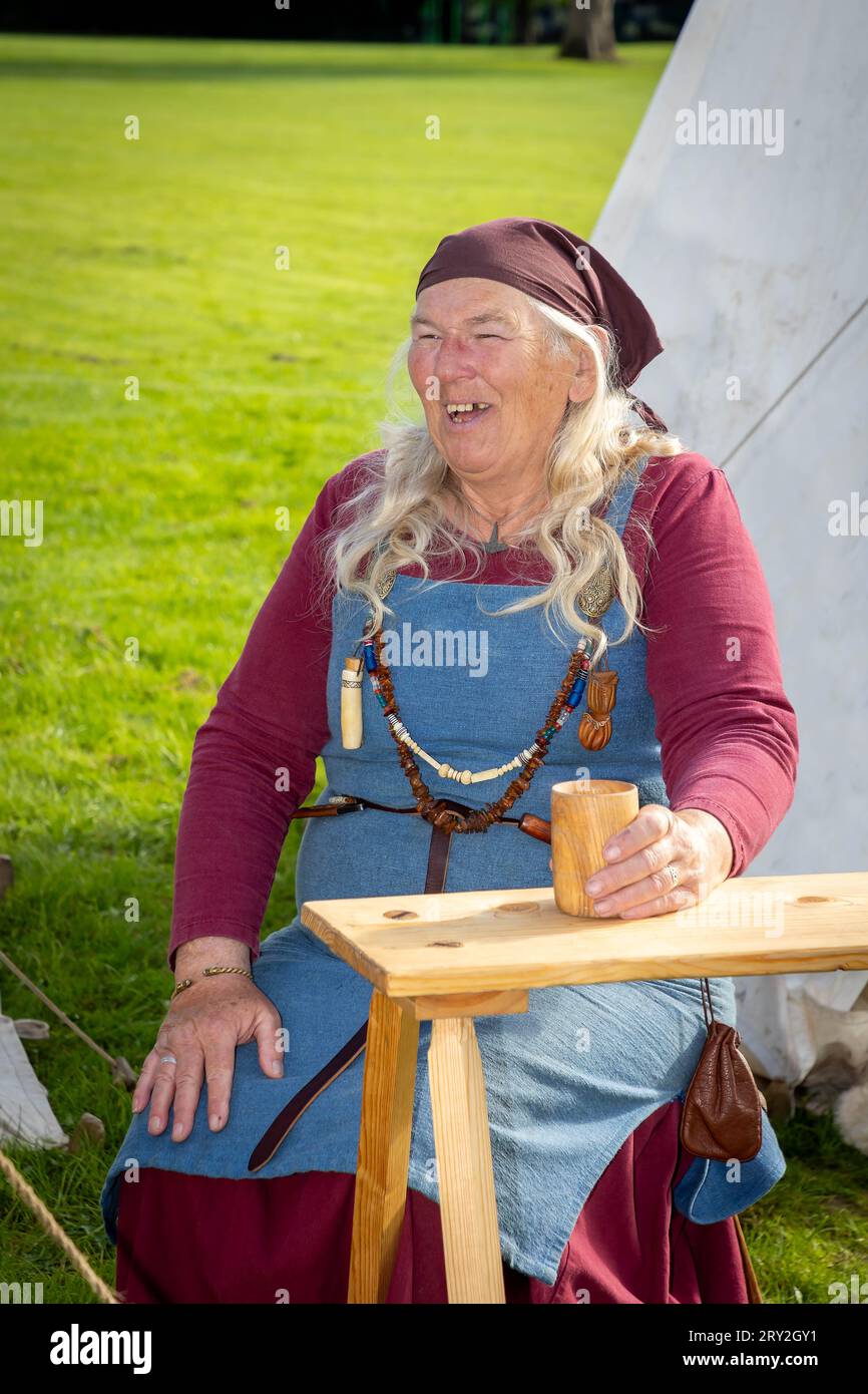 Viking woman drinking and laughing whilst celebrating 1100 years of the ...
