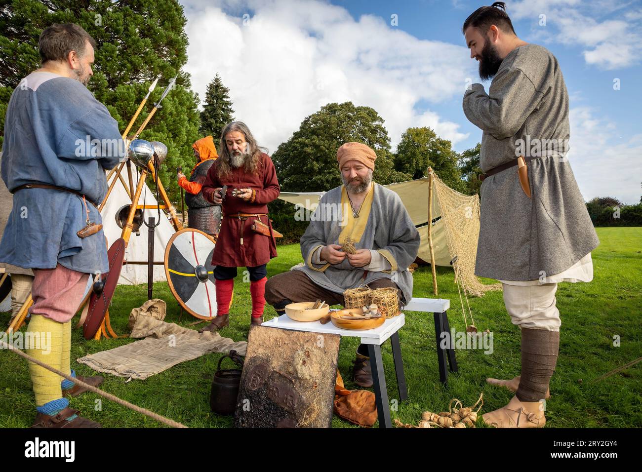Viking male making fishing nets whilst celebrating 1100 years of the ...