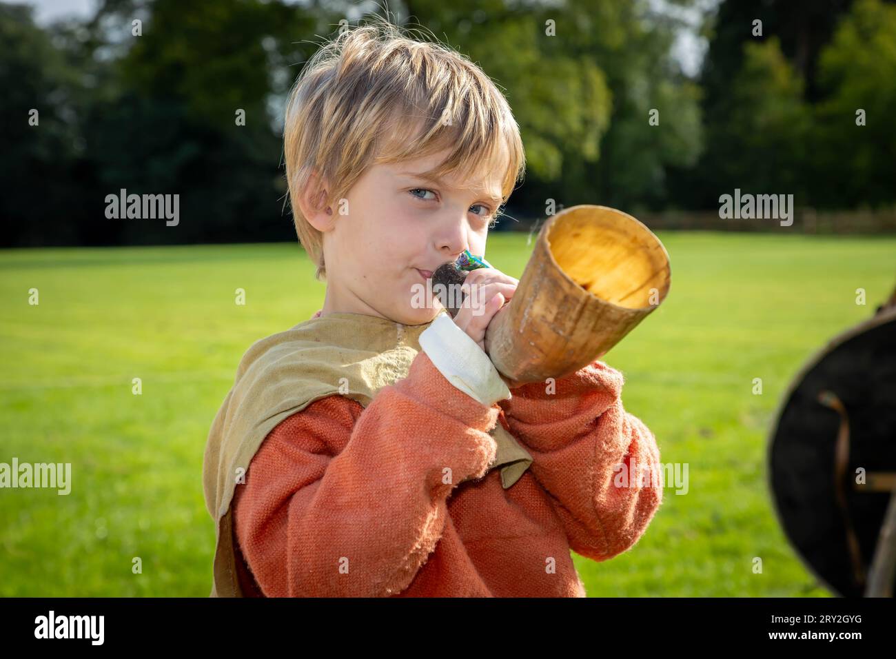 Viking boy blowing a horn whilst celebrating 1100 years of the ancient ...