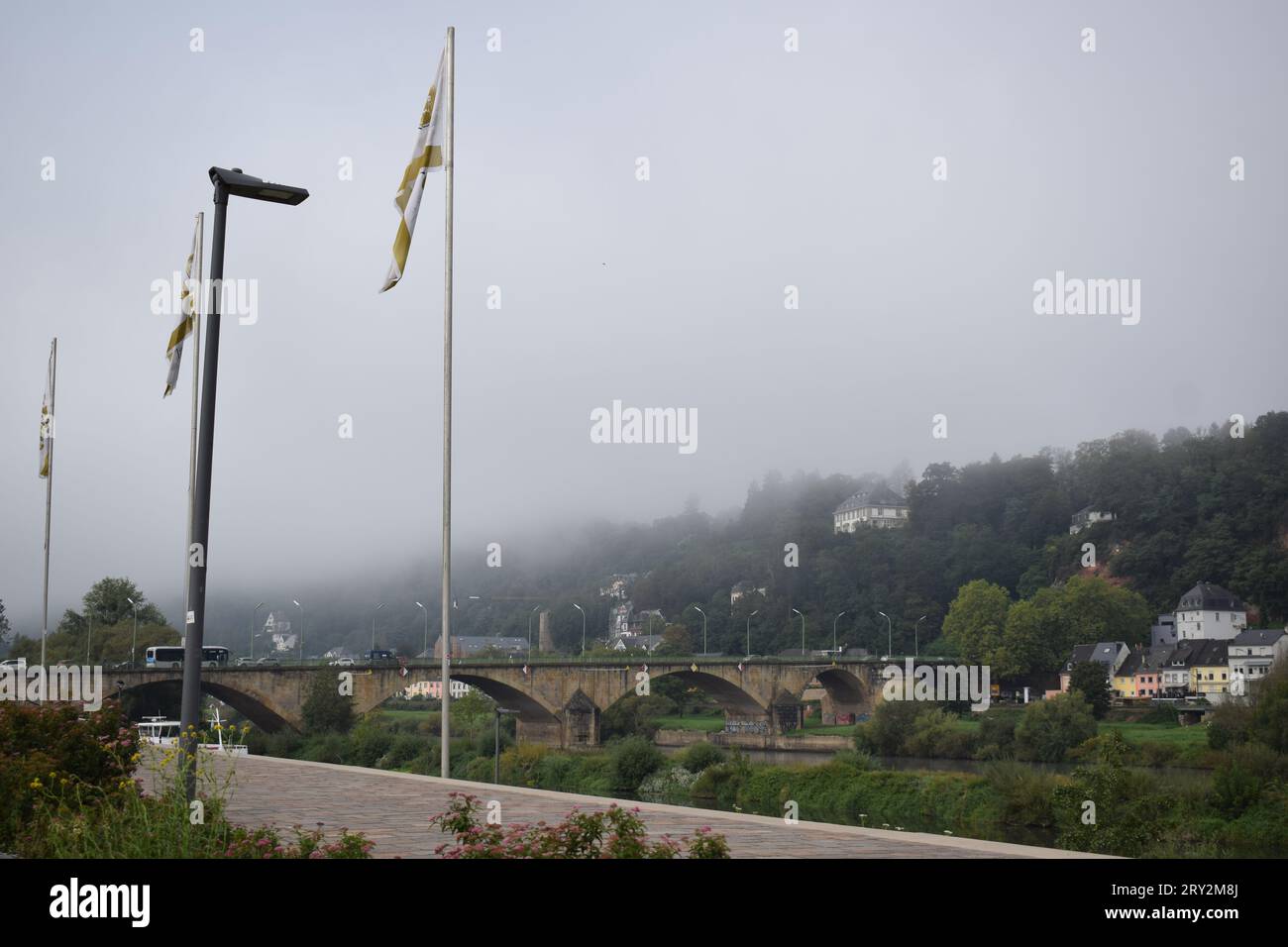Mosel bridge in Trier with fog Stock Photo - Alamy