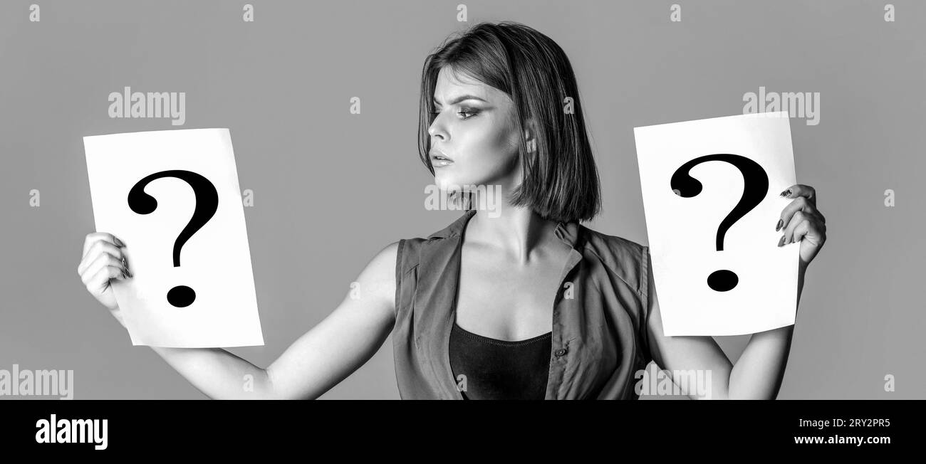 Paper notes with question marks. Confused female thinking with question ...