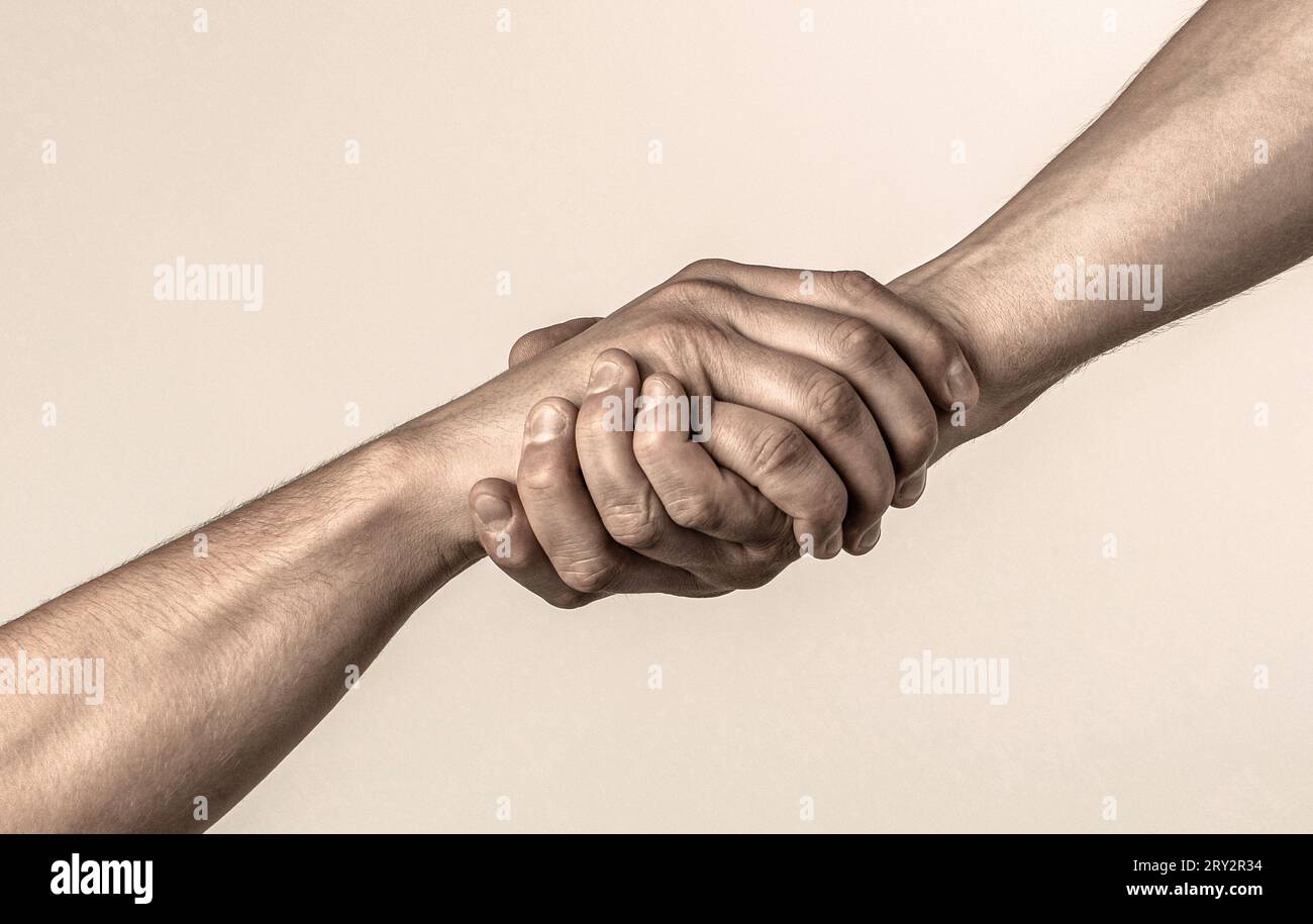 Lending a helping hand. Handshake, arms friendship. Friendly handshake, friends greeting ...