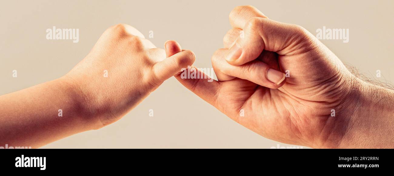 Father, daughter hand making promise friendship concept. Child hook ...