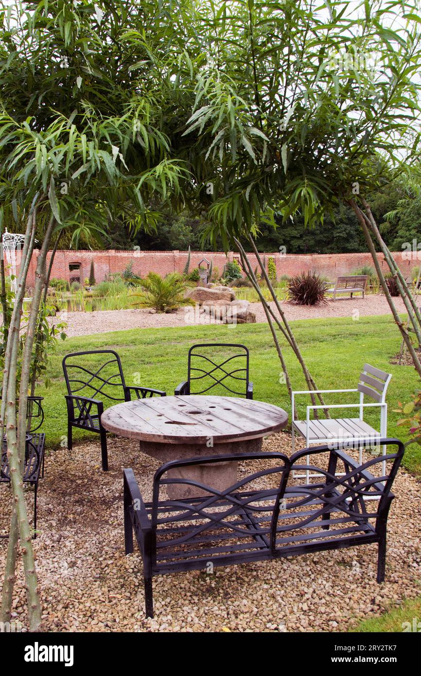 Willow Arbour seating area in Baumber Walled Garden Stock Photo - Alamy