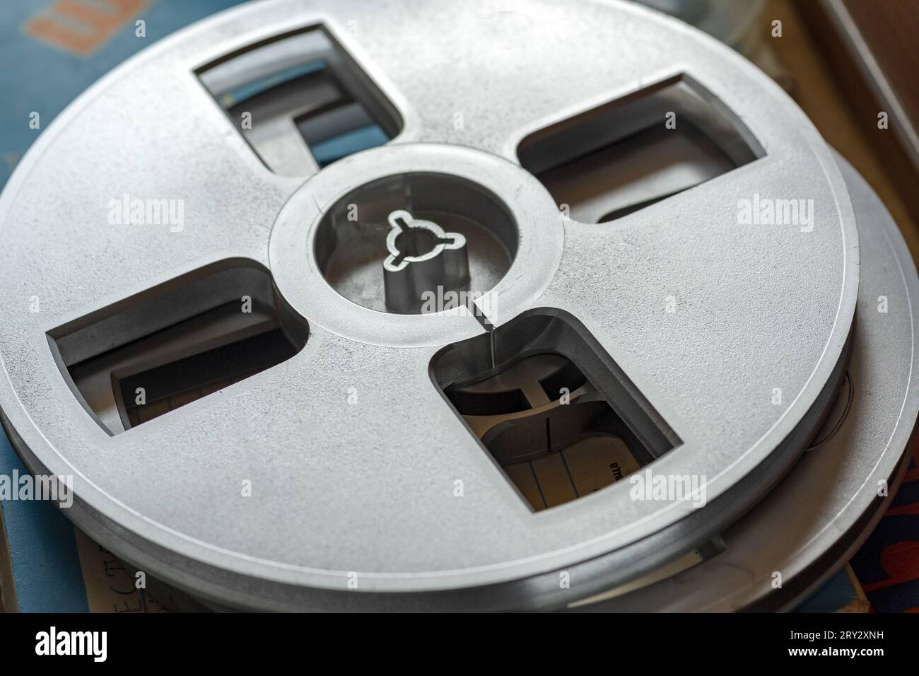 stock, strip. Old Film reel, bobbin, spool against a dark . close up ...