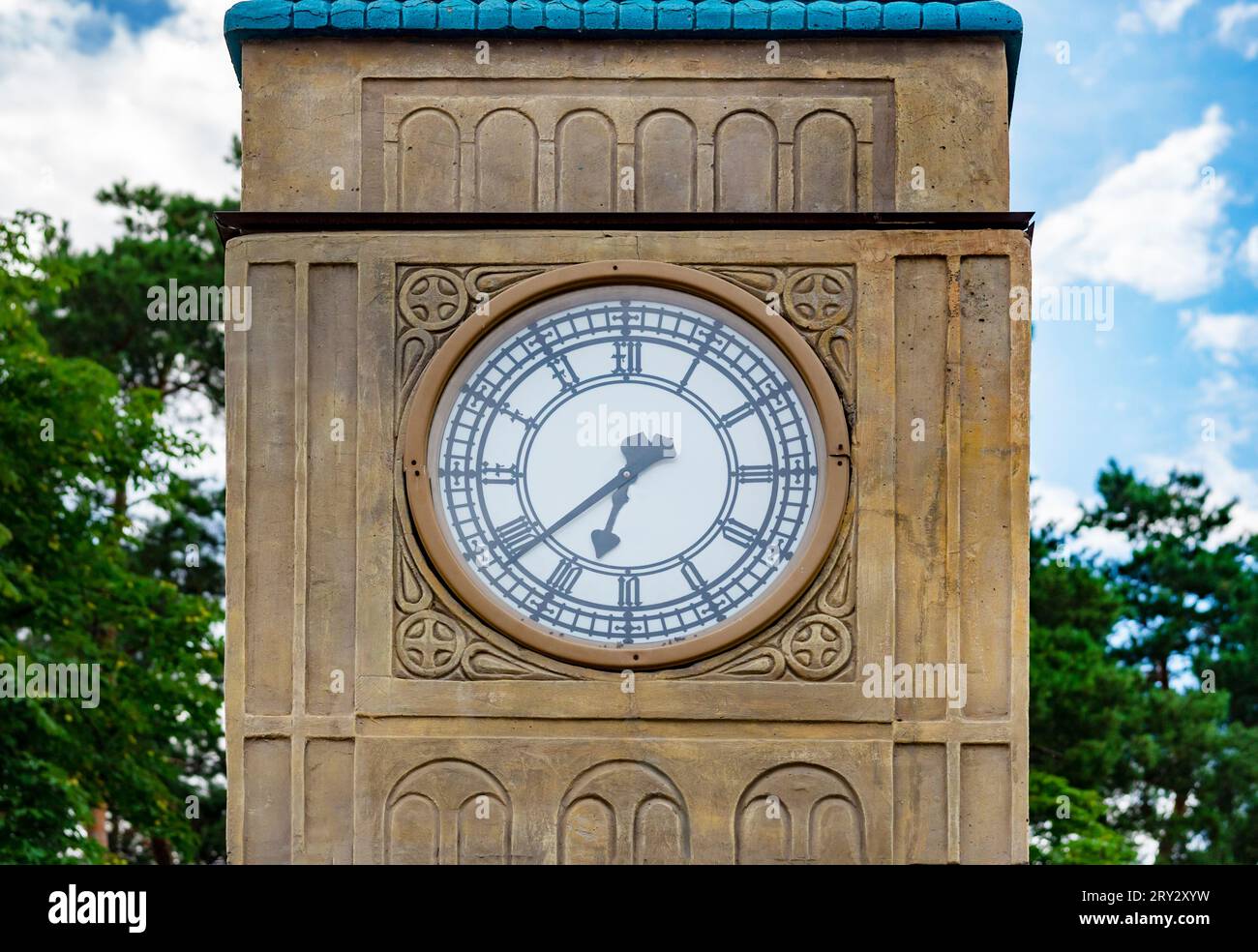 The clock on the tower. Round dial of the clock on the background of ...