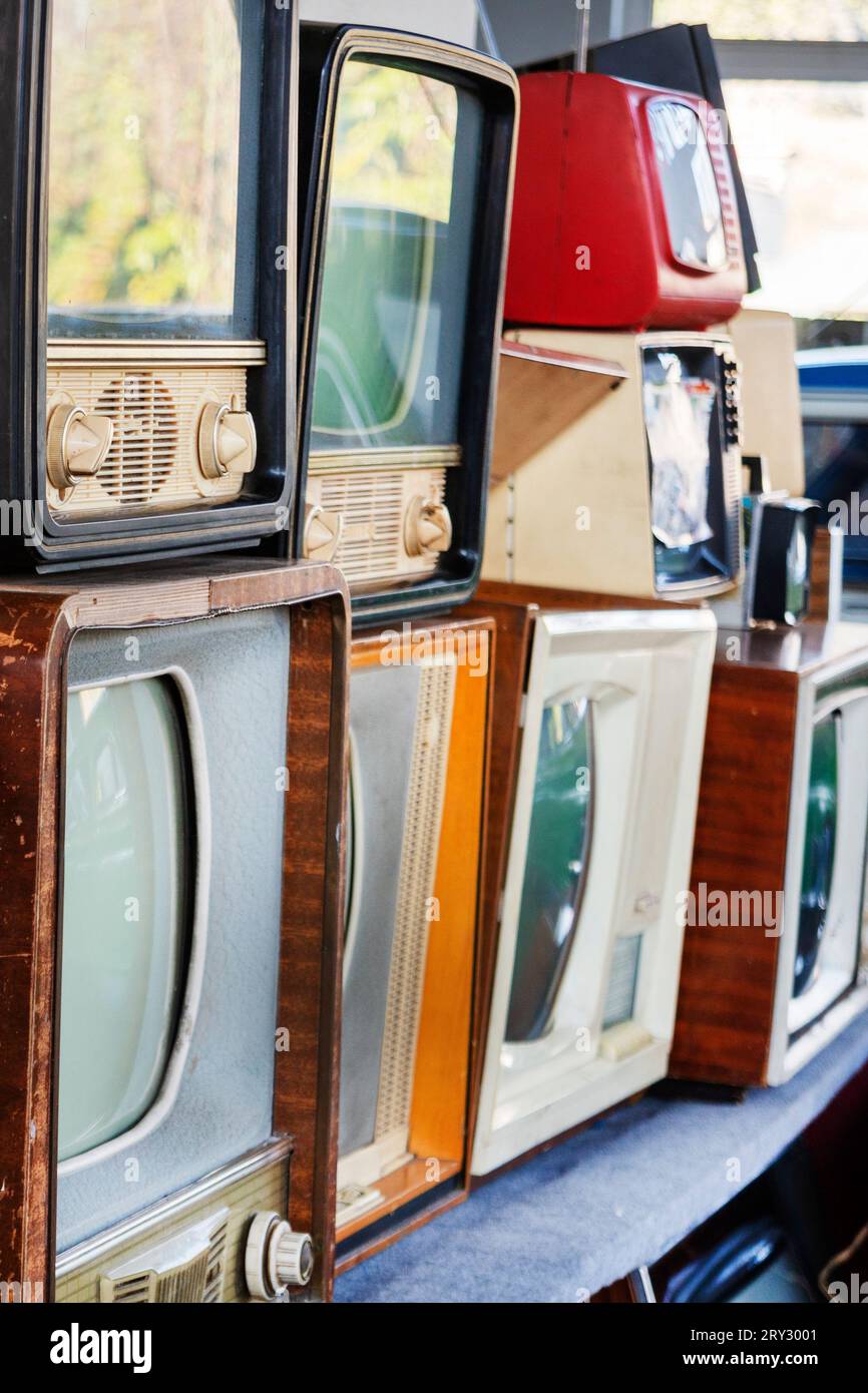 Many retro television. vintage old TV is colorful multi-row. Seeing the ...