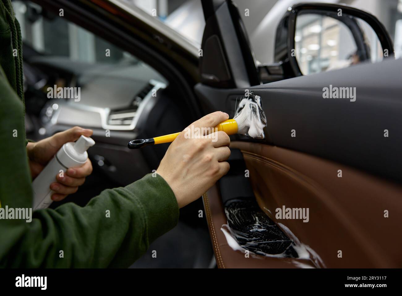 Automotive fittings cleaning inside car process closeup Stock Photo - Alamy