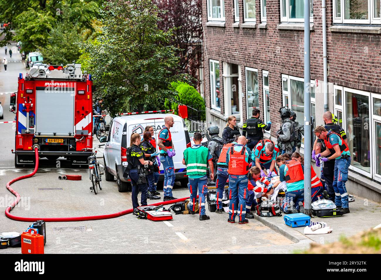 ROTTERDAM - Special units of the police and fire brigade at a fire in a ...