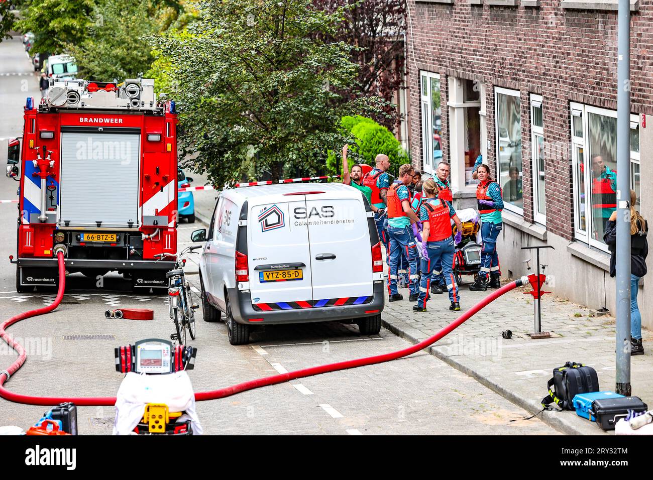 ROTTERDAM - Special units of the police and fire brigade at a fire in a ...